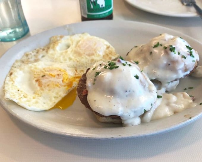 Biscuits and gravy with a perfectly fried egg—the breakfast equivalent of a warm hug from your favorite grandma on a cold Wisconsin morning.