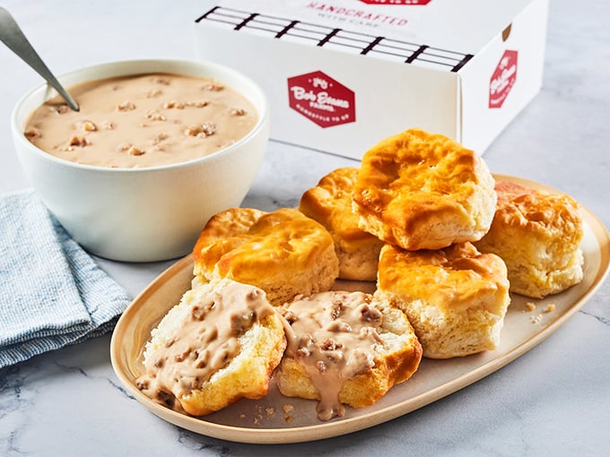 Golden biscuits bathing in creamy sausage gravy – the breakfast equivalent of a warm hug from your favorite grandparent.