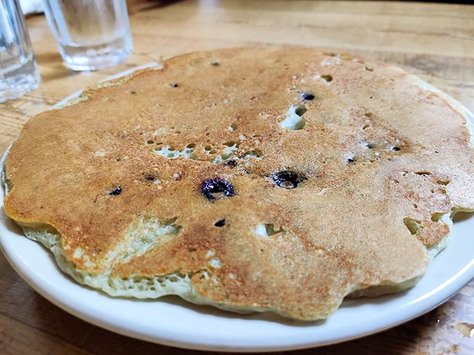 These blueberry pancakes aren't just breakfast, they're therapy—fluffy, golden-edged, and studded with berries that pop like tiny flavor bombs.