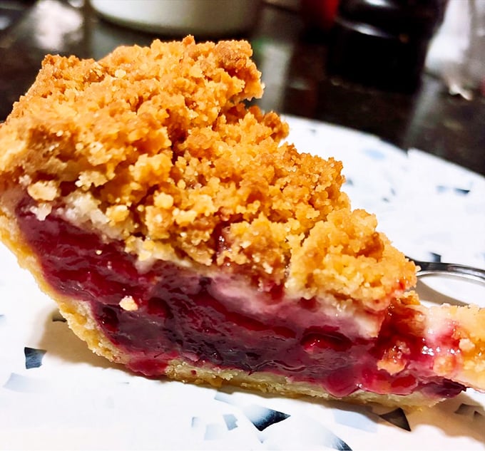 The boysenberry apple crumb pie—where fruit and buttery topping unite in a marriage so perfect it deserves its own reality show.