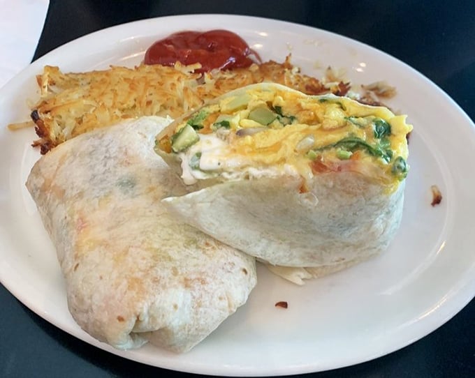 Breakfast's greatest hits wrapped in a tortilla – this burrito with its side of hash browns is California morning cuisine at its finest.