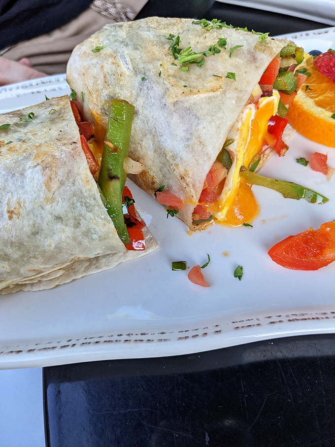 Breakfast burritos bursting with vibrant veggies and melty cheese—proof that good things come in tortilla-wrapped packages.
