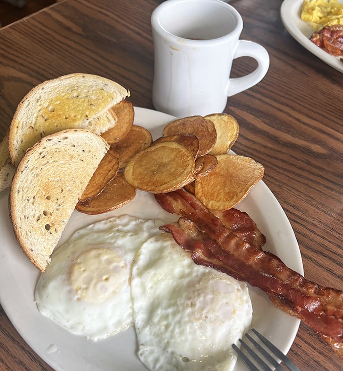 Breakfast perfection doesn't exi— Oh wait, here it is. Those sunny-side-up eggs are practically winking at you, promising a morning worth getting out of bed for.