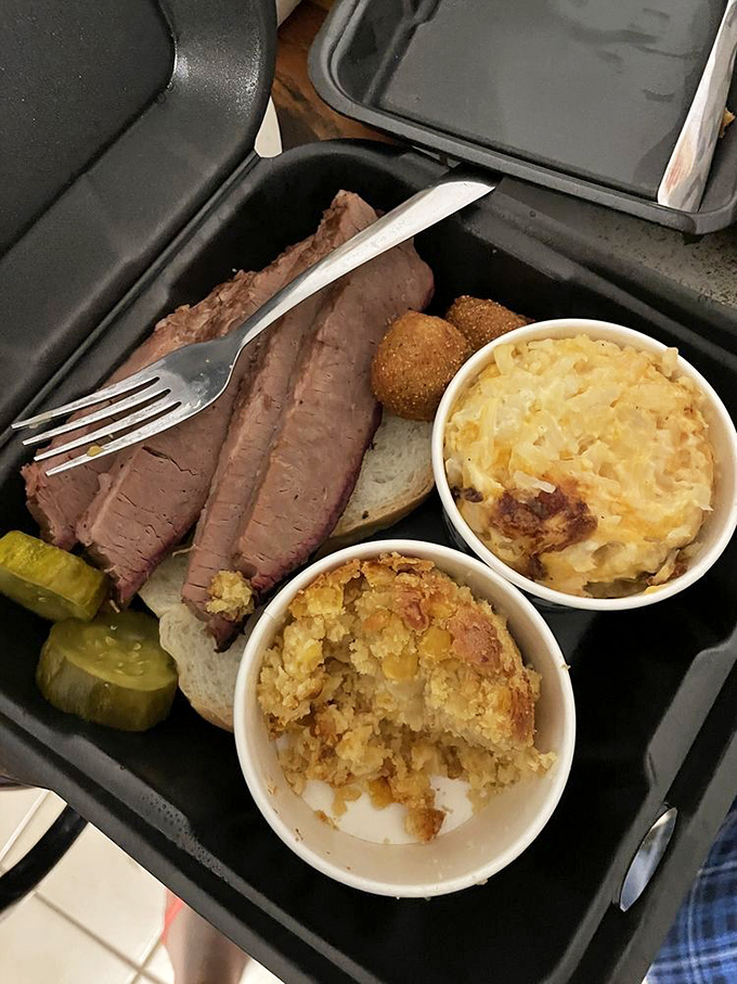 Brisket sliced thick enough to respect the craft, paired with sides that know their supporting role in this meaty drama.