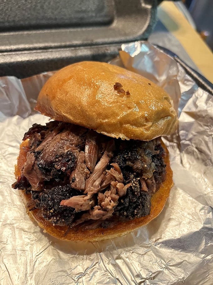 The brisket sandwich – where smoke meets bread in a relationship so perfect it should have its own country song.