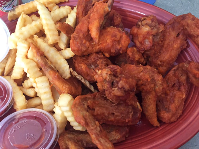 These aren't just any wings – they're the kind that make you forget your table manners and reach for another before you've finished the first.