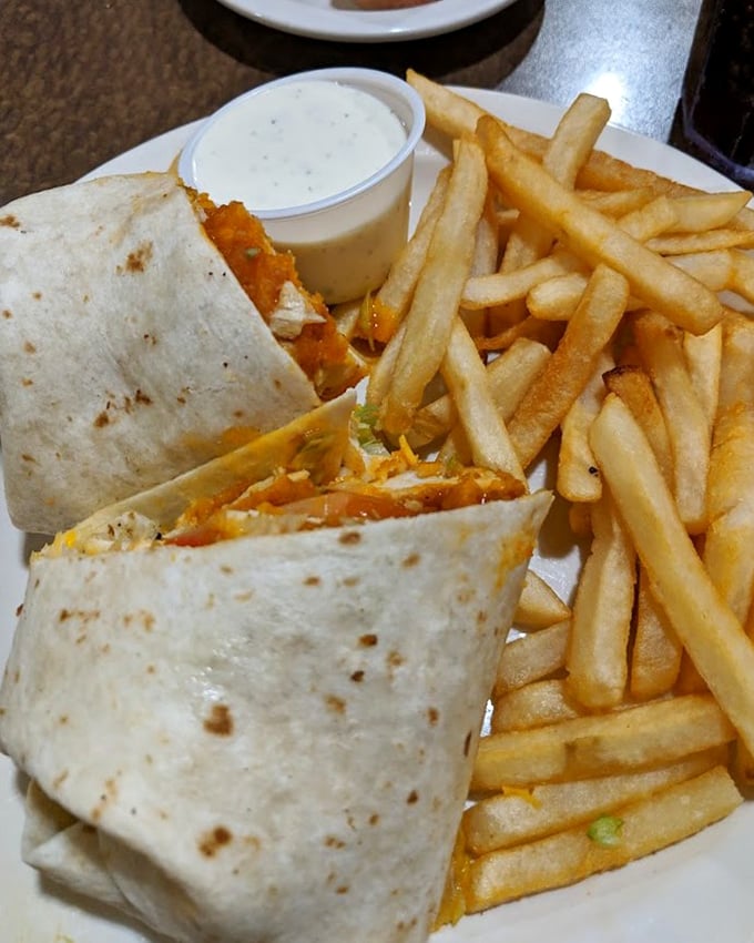 The Buffalo Chicken Wrap brings the heat without setting your taste buds on fire—a civilized approach to spice with cooling ranch as the peacekeeper.