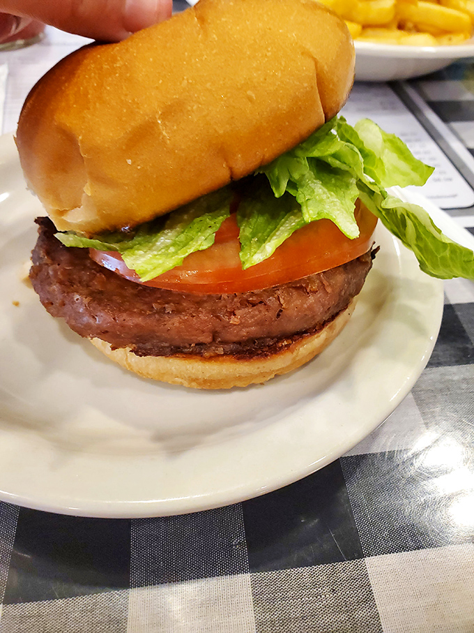 This isn't some fancy gastropub creation—it's the burger your taste buds have been dreaming of since childhood, honest and unfussy.