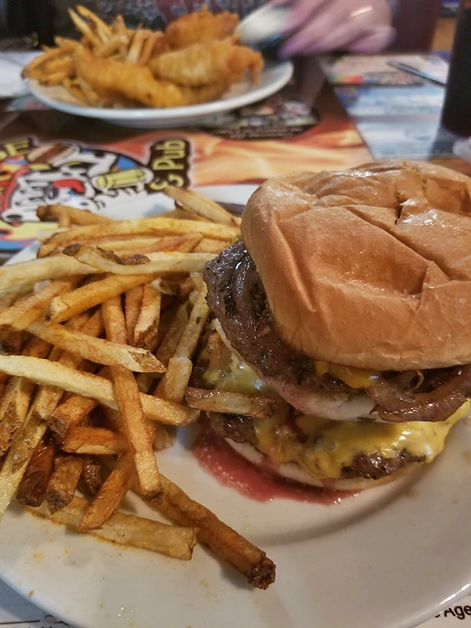 This isn't just a burger—it's an architectural masterpiece of beef, cheese, and toppings that requires both hands and several napkins.