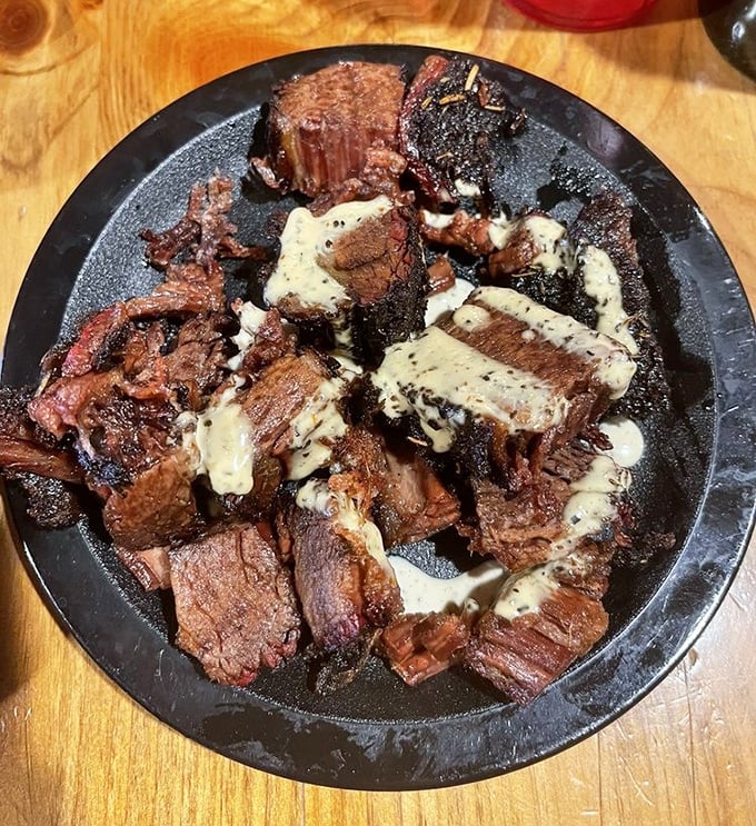 Burnt ends: where brisket goes to achieve its final, glorious form. The sauce drizzle is just showing off at this point.