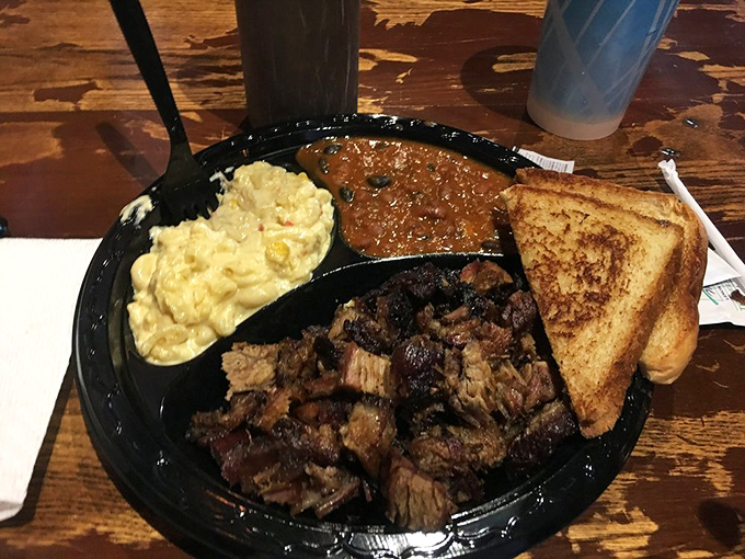 Burnt ends, mac and cheese, and Texas toast – the holy trinity of smokehouse dining. Notice there's no green stuff cluttering this plate.