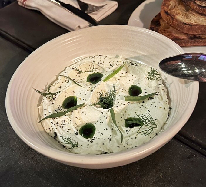 The buttermilk ricotta arrives like a cloud on earth—ethereal, delicate, and somehow making those little green dots taste like revelation.