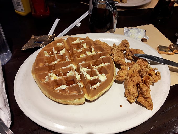 The chicken and waffle combo – where maple syrup creates the perfect sweet-savory marriage that would make even the most jaded food critic weep with joy.