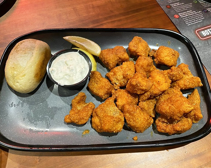 Catfish nuggets that could make a seafood skeptic reconsider their life choices. Golden, crispy, and served with a side of Southern hospitality.