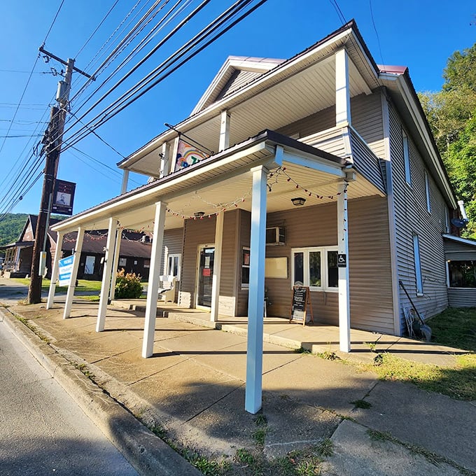 Classic front porches like this aren't architectural features—they're Emporium's social network where news travels faster than any Wi-Fi signal.