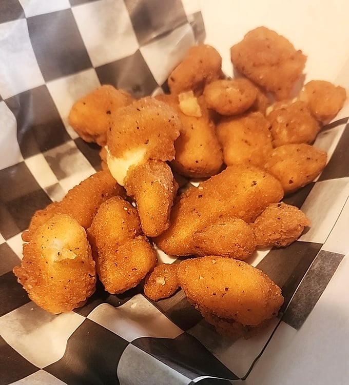 Golden cheese curds that make Wisconsin jealous—each bite whispers sweet, melted promises of dairy decadence.