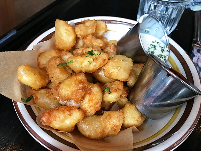 Cheese curds that squeak in your mouth and speak to your soul—the Midwest's greatest contribution to happiness since Bob Newhart.