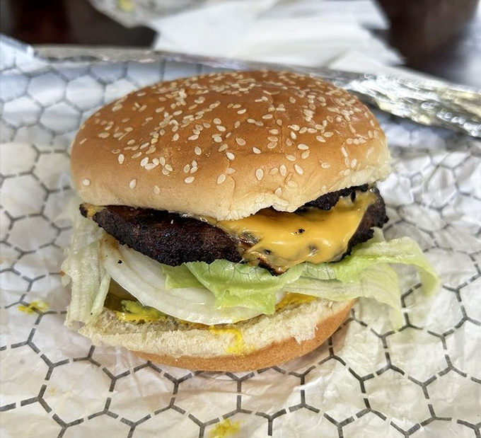 Even the humble cheeseburger gets the respect it deserves—a perfectly melted slice of American cheese atop a well-seasoned patty.