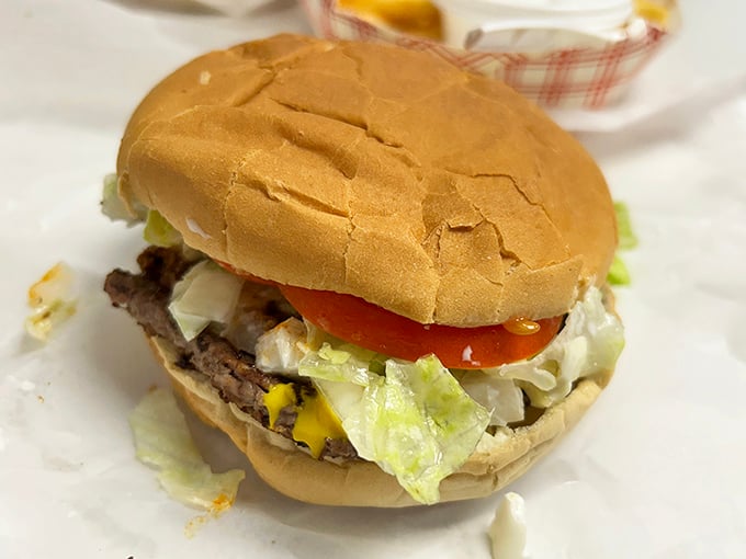 The humble cheeseburger, elevated not by pretension but by execution. Every component in perfect harmony, like a Beatles song you can eat.
