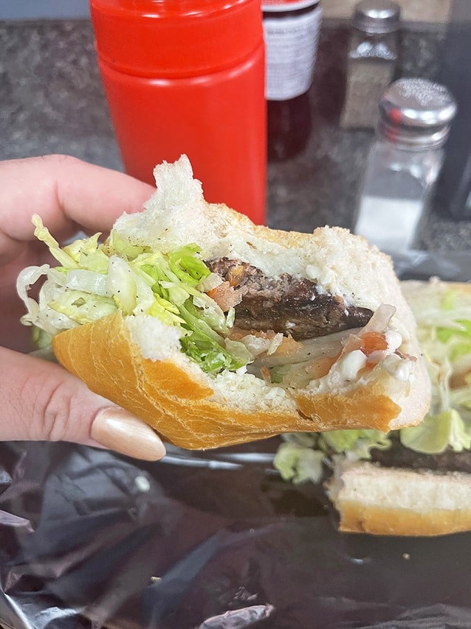 One bite of this masterpiece and you'll understand why some people plan entire road trips around sandwiches.
