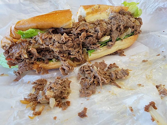 A proper cheesesteak should require a stance—the "sandwich hunch"—to avoid wearing half of it home. This beauty demands exactly that.