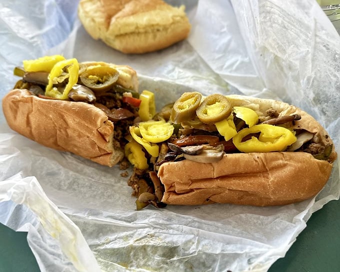 Behold the star of the show—a Philly cheesesteak that would make Rocky himself climb those steps in celebration. The banana peppers add that Florida twist.