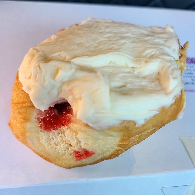 The cherry cheese donut—where fruit meets frosting in perfect harmony. It's the dessert equivalent of finding money in your winter coat pocket.