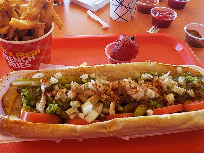 The Chicago Dog arrives dressed for success with its garden of toppings – proof that sometimes more is exactly the right amount.