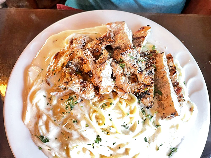 Fettuccine Alfredo that puts chain restaurants to shame – silky pasta embraced by a creamy sauce with grilled chicken that's actually seasoned properly. Revolutionary concept!