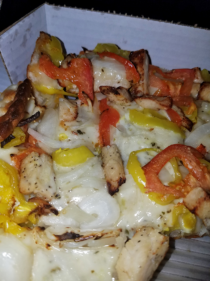 Terita's chicken special showcases their versatility beyond pizza – grilled chicken, peppers, and cheese melding into a harmonious flavor symphony.