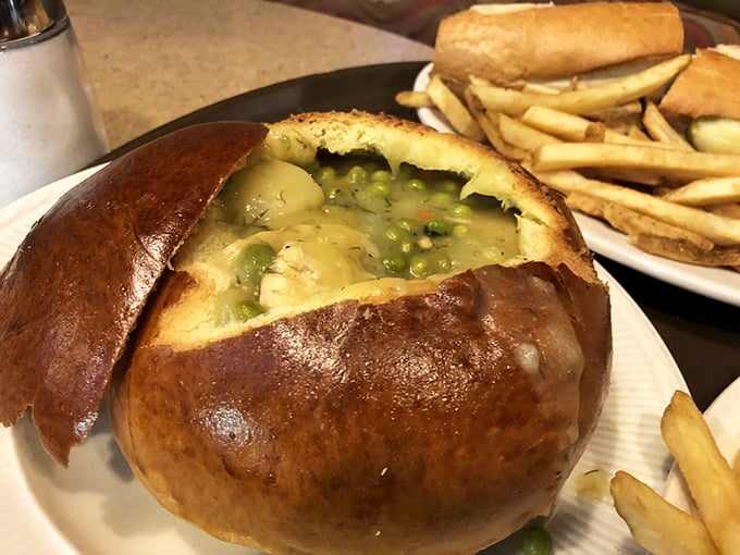 This bread bowl isn't just serving soup; it's offering a warm, edible hug. Comfort food architecture at its most brilliant.