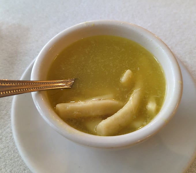 Clear broth, tender noodles—this unassuming soup is the opening act that somehow manages to steal part of the show. Liquid comfort in a cup.