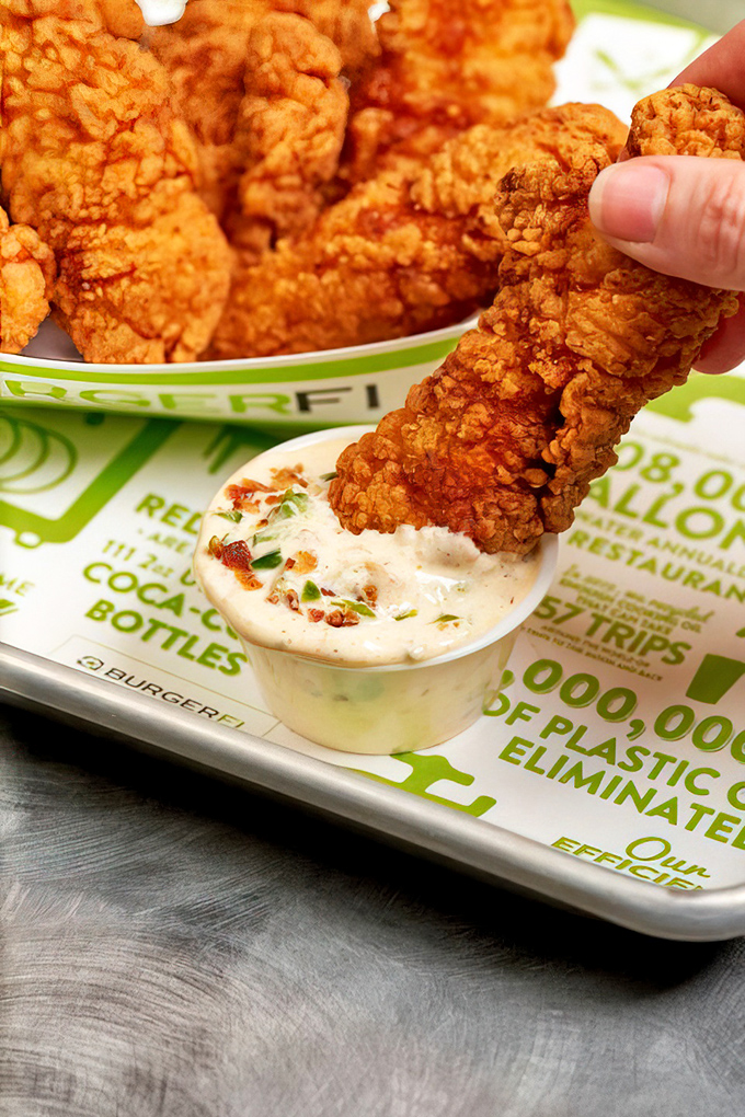 Golden chicken tenders with that perfect crispy coating that sounds like applause when you bite down.