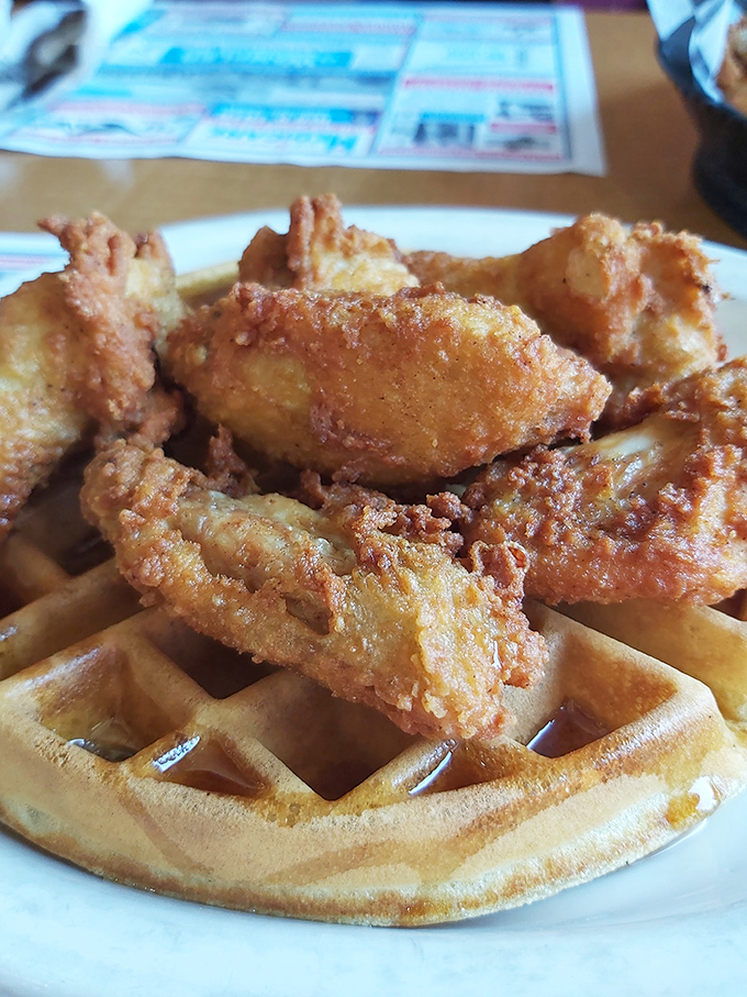 Crispy meets fluffy in the chicken and waffle combo—breakfast and dinner having a delicious argument on the same plate.