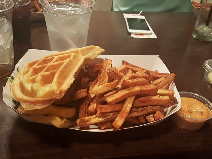 When a waffle and fries share a plate, magic happens. This isn't breakfast-meets-dinner; it's a comfort food summit with delicious diplomatic relations.