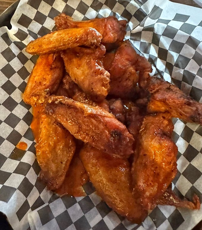 Wings that don't need a sporting event excuse—gloriously saucy, perfectly crisp, and demanding to be devoured with absolutely zero concern for napkin consumption.