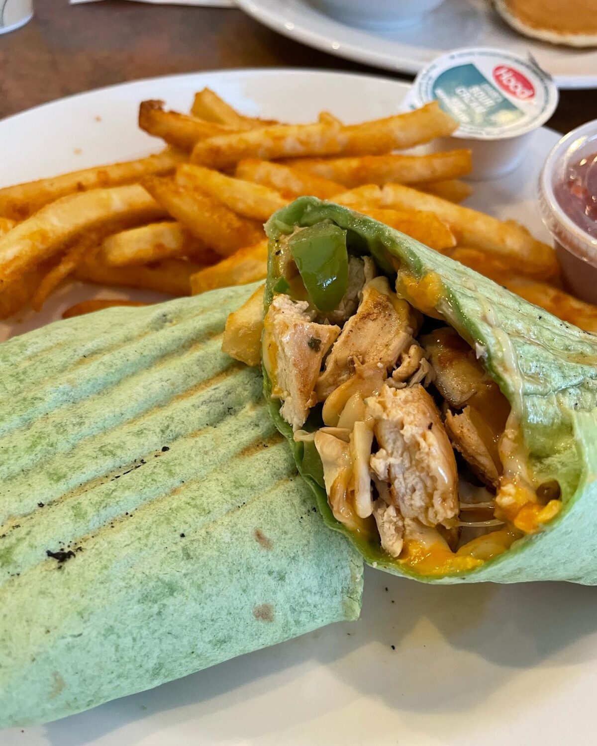 The chicken wrap that answers the eternal question: "Can healthy food actually taste indulgent?" Spoiler alert: at Collegeville Diner, it absolutely can. 
