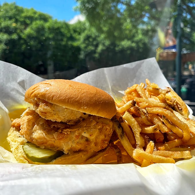 The chicken sandwich that launched a thousand lunch breaks. Crispy fried chicken, pickles, and a soft bun – simplicity that puts trendy chicken chains to shame.
