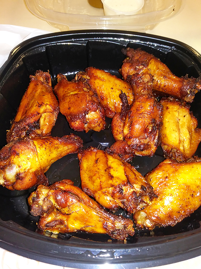 These wings aren't just smoked, they're transformed – like chicken that went on a spiritual journey and came back with stories to tell.
