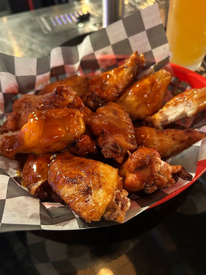 These honey-glazed wings aren't just food—they're a religious experience with crispy skin, juicy meat, and sauce that should be bottled and sold as liquid gold.