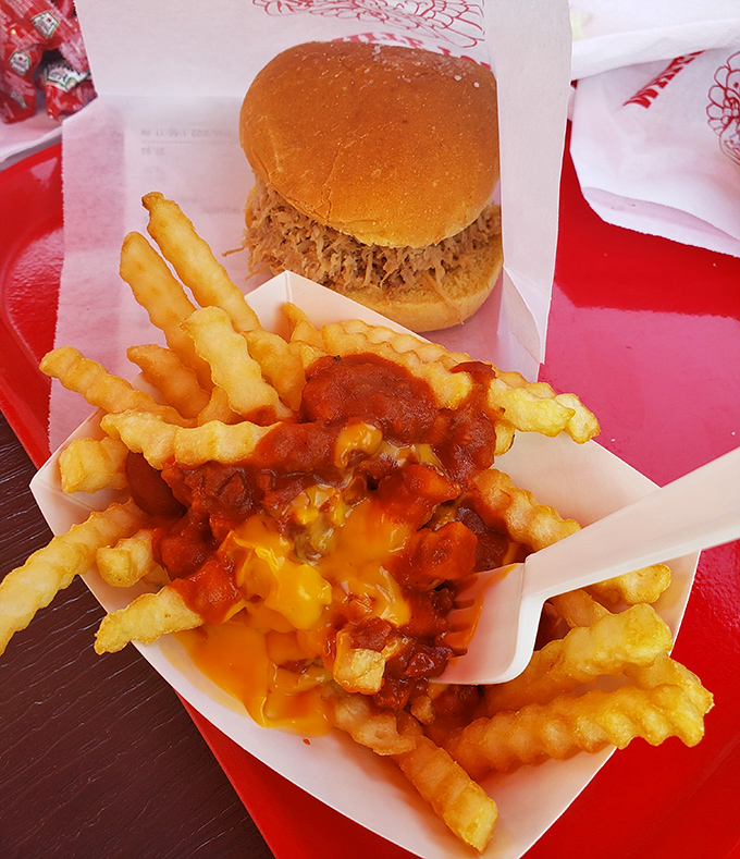 Chili cheese fries that laugh in the face of diet plans—a glorious mess of crispy, cheesy, meaty goodness that demands both fork and fingers.