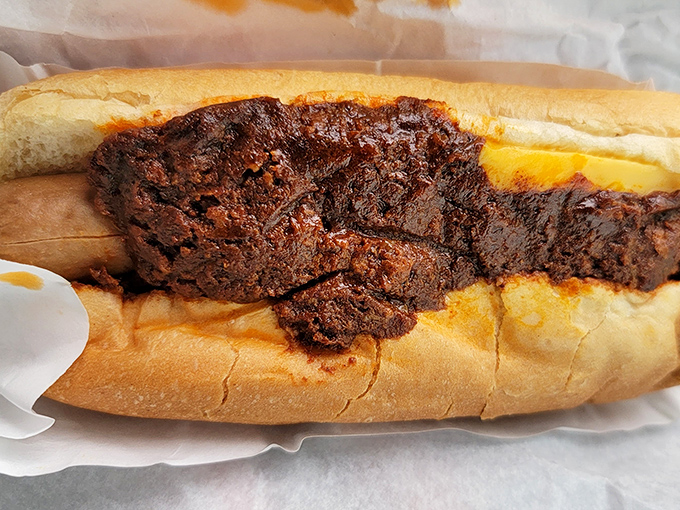 Not just any chili dog—a Mugs-Up chili dog. The kind that requires strategic napkin placement and zero white clothing.