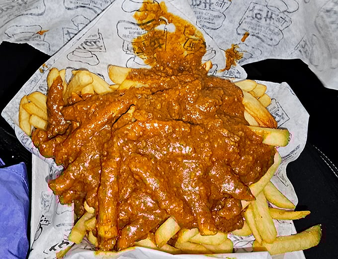 These aren't just chili cheese fries; they're a monument to excess that somehow manages to be worth every delicious, messy bite.