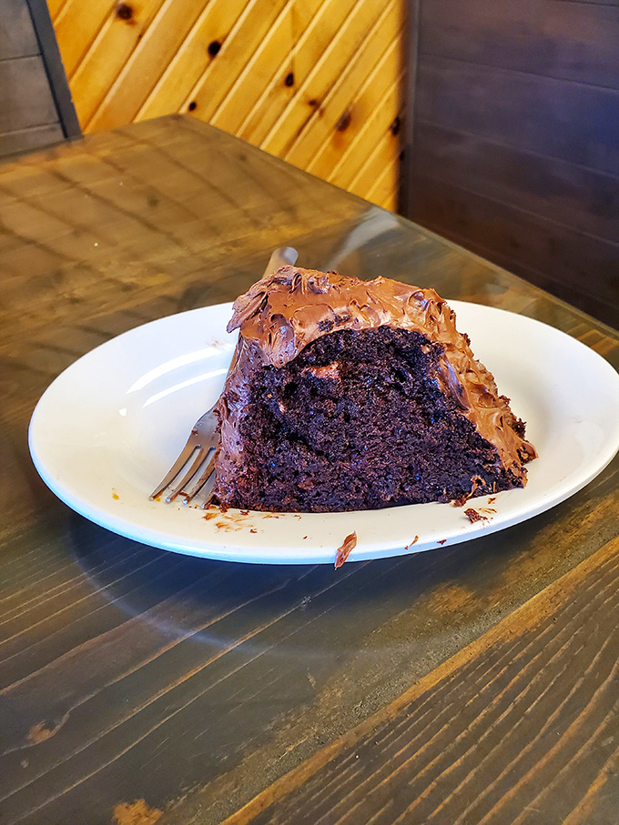 Chocolate cake that doesn't need fancy French names or imported cocoa to impress. Just fork-tender richness that makes you close your eyes with each bite.