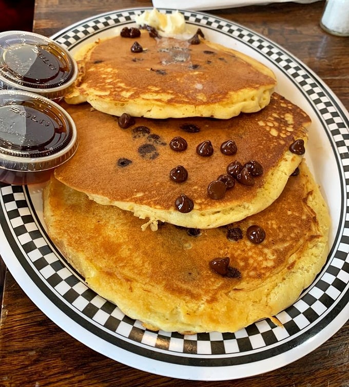 Stack 'em high and watch 'em fly – chocolate chip pancakes that would make Willy Wonka jealous.