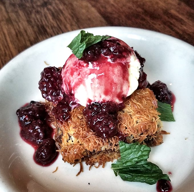 Konafi reimagined: crispy phyllo cradles sweet cheese while berry compote and ice cream turn tradition into something transcendent.
