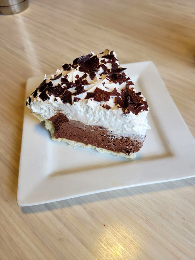 Chocolate cream pie that makes you consider dessert first – because sometimes life's big decisions should start with whipped cream and chocolate shavings.