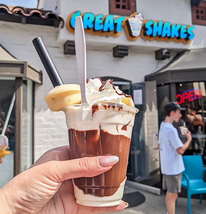 This chocolate shake looks thick enough to stand a spoon in – the kind that makes straws work for their paycheck.
