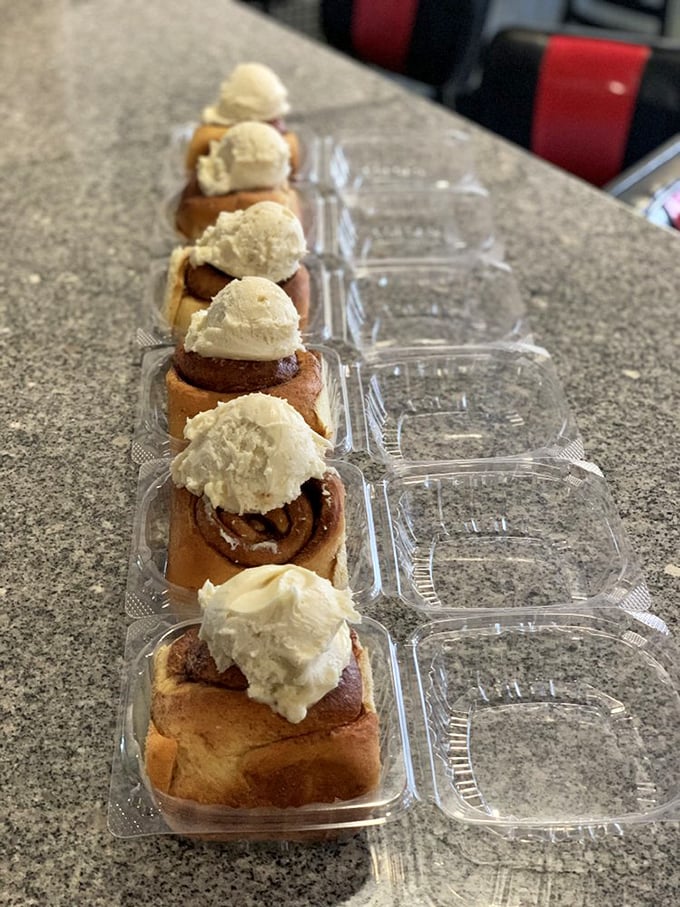 These aren't just cinnamon rolls—they're edible time machines topped with vanilla ice cream, transporting you straight back to childhood bliss.