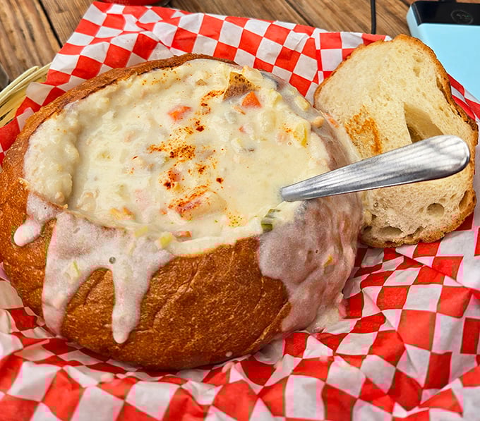 Clam chowder so hearty it's practically a life raft, served in a sourdough bread bowl that's both vessel and dessert.